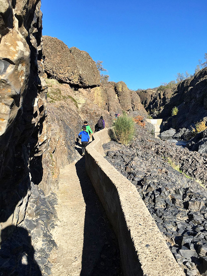 Adventure awaits on Upper Bidwell Park's rugged trails, where hikers navigate the volcanic landscape like explorers on a mini-Mars.