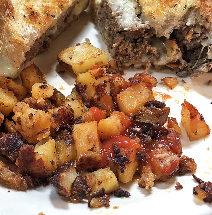 The legendary home fries that launched a thousand food pilgrimages. Perfectly seasoned, impossibly crispy, and worth every mile of the drive to Cleveland.
