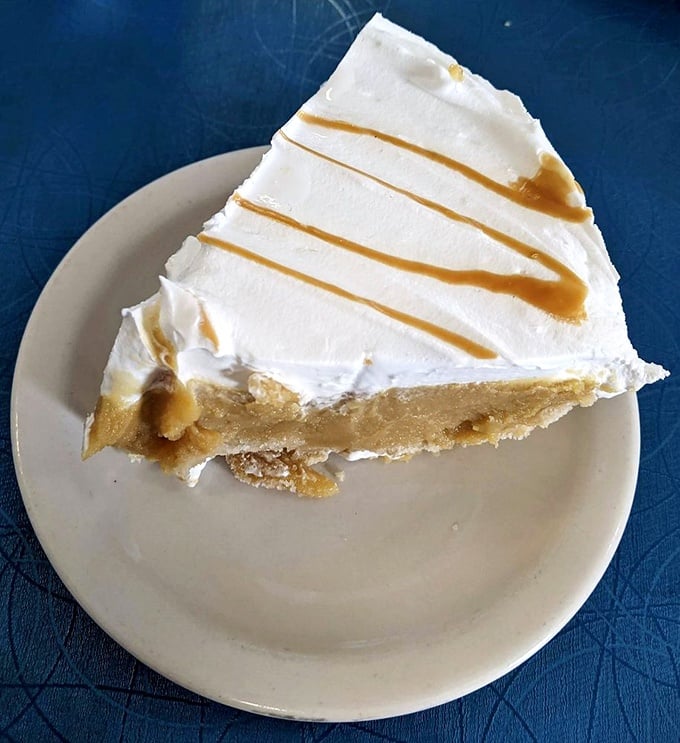 Butterscotch pie with whipped cream so light it practically hovers above the plate. Diet plans come here to die happy.