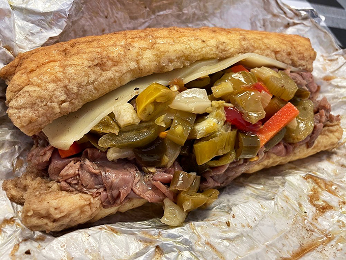 This isn't just an Italian beef sandwich; it's a masterpiece of thinly sliced heaven, giardiniera crunch, and bread that knows its supporting role.