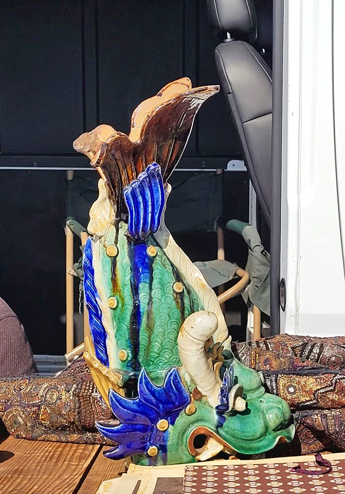 This glazed ceramic dragon wouldn't look out of place in an emperor's palace or your eclectic living room. Art transcends time and borders.