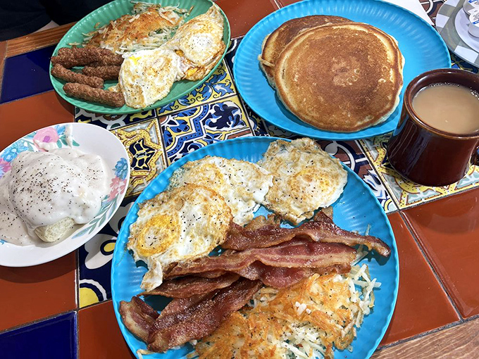 Jeff's Big Breakfast arrives like a beautiful mountain range of protein and carbs—the kind of plate that makes you want to cancel lunch plans.