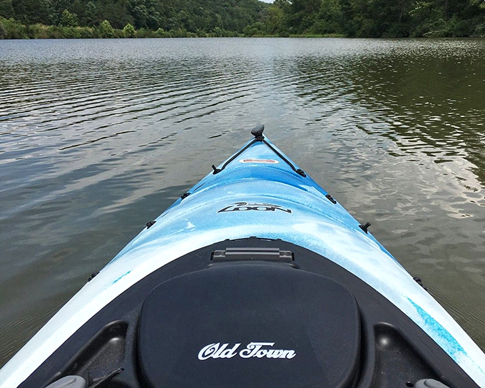 From this blue kayak's-eye view, the world slows down and everyday worries drift away with each gentle paddle stroke.