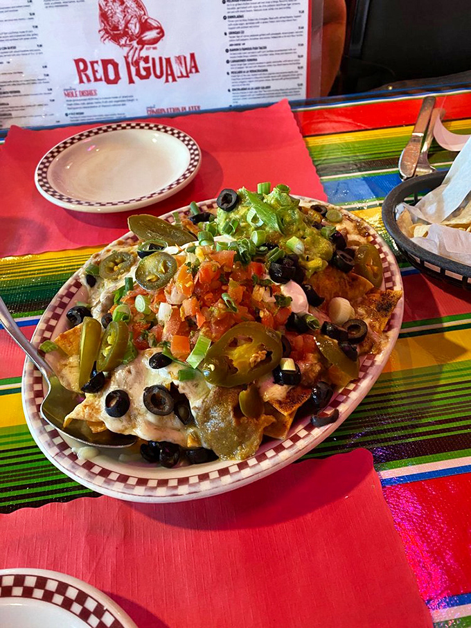 These nachos aren't just loaded &ndash; they're having an existential crisis about whether they're still nachos or have evolved into something far more magnificent.