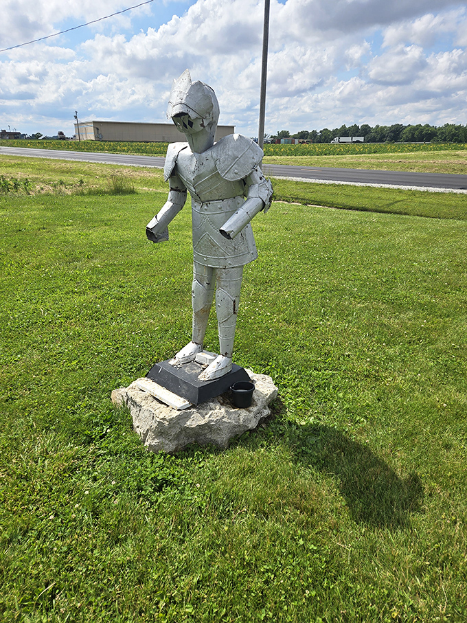 The knight stands guard nearby, a metallic protector seemingly plucked from medieval times and dropped into the cornfields of central Illinois.