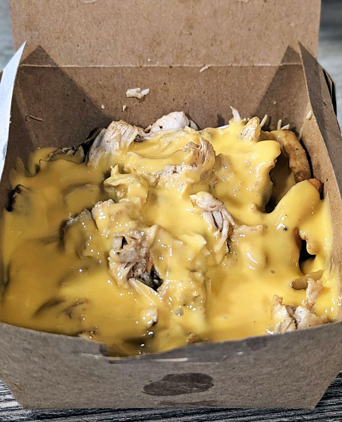 Behold the golden cascade! Cheese wiz transforms ordinary chicken into something worth crossing state lines for. Diet plans, consider yourselves postponed.