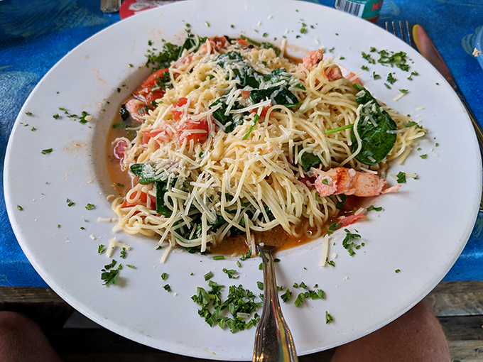 The lobster pasta arrives like a celebrity&mdash;chunks of Maine lobster mingling with spinach and tomatoes in a white wine butter sauce that deserves its own ZIP code.