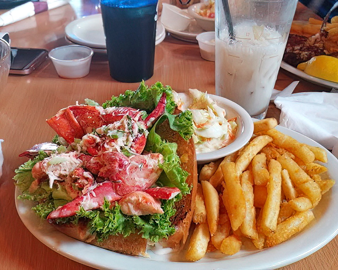 The legendary lobster roll in its natural habitat&mdash;surrounded by golden fries and anticipation. Maine might be calling to complain about this landlocked masterpiece stealing its thunder.