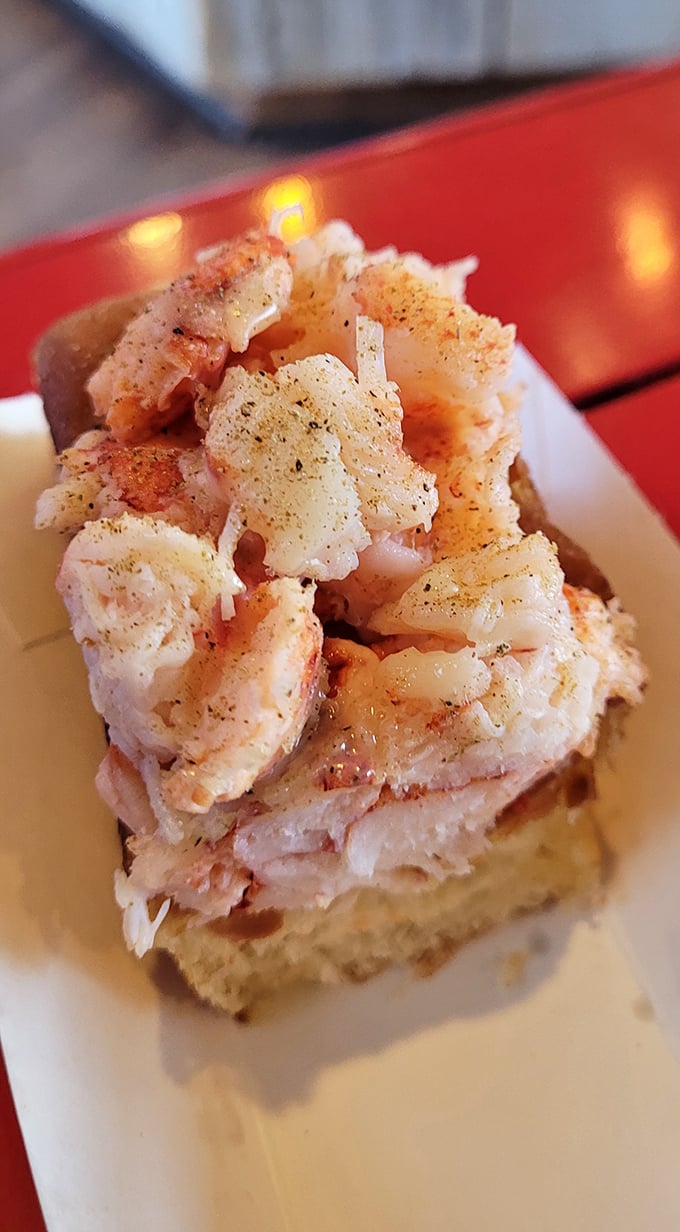 Chunks of sweet Maine lobster meat, perfectly seasoned and piled high. This isn't just a sandwich&mdash;it's edible evidence that sometimes simplicity truly is perfection.