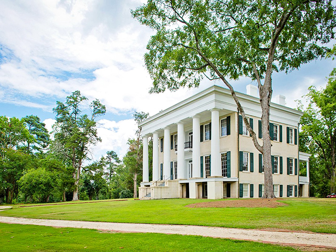 Lockerly Arboretum's stately mansion emerges from its verdant surroundings like a Southern belle making her grand entrance at the season's most anticipated garden party.