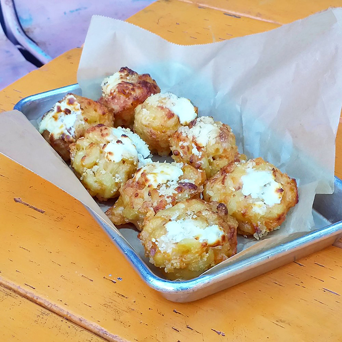 These Mac & Cheese Muffins are what happens when comfort food gets dressed up for a night out&mdash;crispy exterior, gooey interior, pure genius.