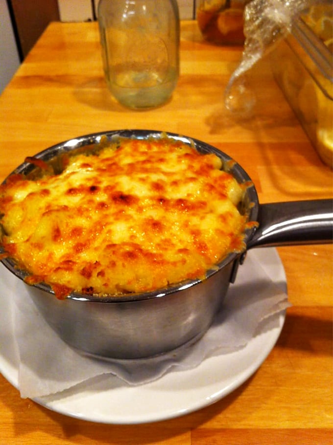 Mac and cheese that's achieved celebrity status—with a golden-brown top that crackles with promise and a molten center that delivers on every childhood dream you've ever had.