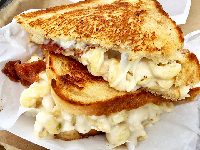 The mac and cheese grilled cheese defies sandwich physics &ndash; somehow combining two perfect comfort foods into something even greater.