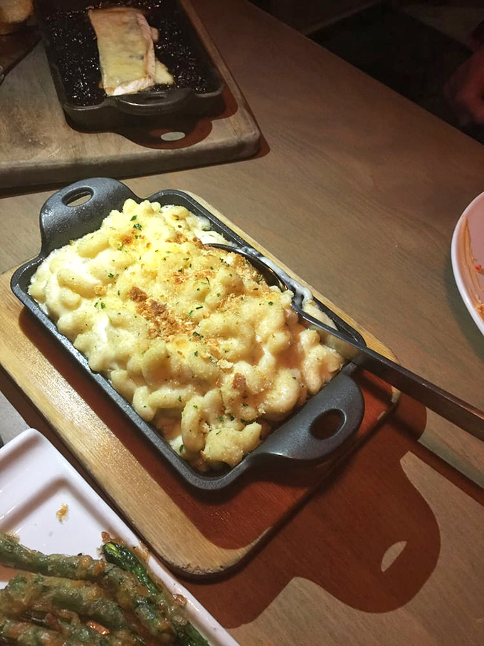 Mac and cheese that's achieved celebrity status in its own cast iron cocoon. This isn't your childhood version&mdash;unless you grew up in culinary heaven.