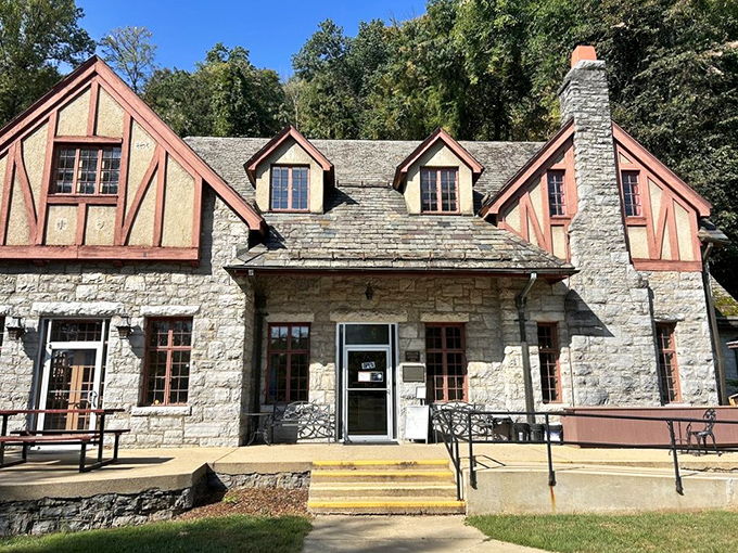 This charming stone lodge welcomes visitors with Tudor-style warmth before they descend into the cool, ancient world beneath.