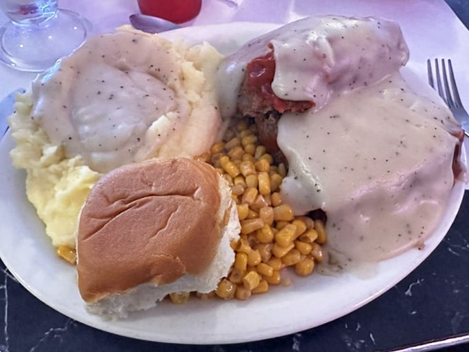 Comfort food that hugs your soul. This meatloaf platter comes with real mashed potatoes, gravy, and a side of simpler times.