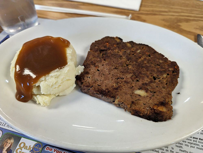Meatloaf that would make your grandmother both jealous and proud, served with mashed potatoes drowning in gravy&mdash;as nature intended.