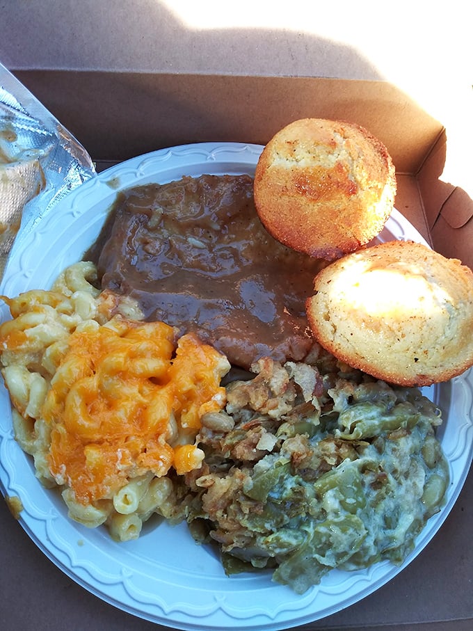 This isn't just meatloaf&mdash;it's a Southern symphony on a plate, where mac and cheese plays backup to the star attraction, and those cornbread muffins deserve their own standing ovation.