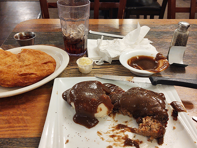 Behold the star attraction: meatloaf bathed in rich gravy that doesn't just satisfy hunger&mdash;it soothes the soul and justifies the drive.