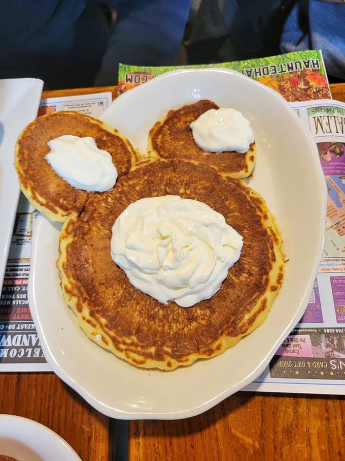 These pancakes with whipped cream dollops aren't just breakfast, they're edible clouds of joy that make Monday mornings feel like Saturday celebrations.