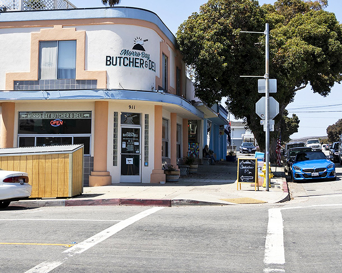The Morro Bay Butcher & Deli sits at a sunny corner, promising the kind of authentic local flavors that make road trips worthwhile.