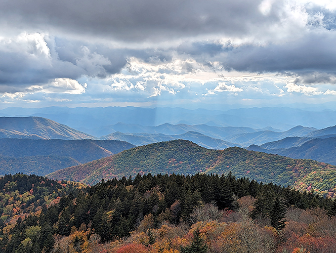 Fall's paintbrush transforms these ancient mountains into a masterpiece that makes Vermont leaf-peepers wonder if they've been visiting the wrong state.