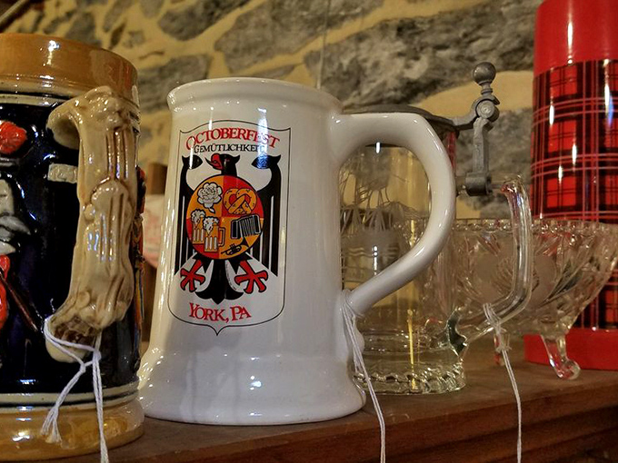 Beer steins and collectible mugs stand at attention, ready to transport your morning coffee ritual back to a more ornate era.
