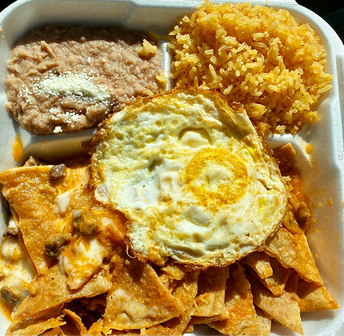 Breakfast of champions? Forget cereal—these nachos topped with a perfect sunny-side-up egg are what morning dreams are made of.
