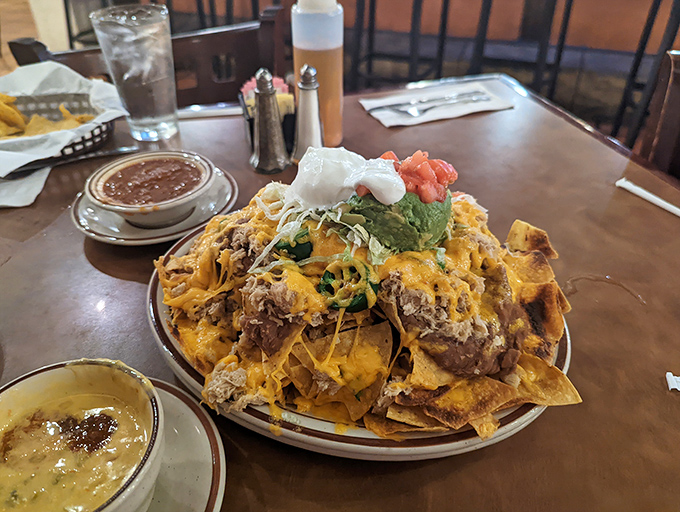 These nachos aren't just a dish, they're an architectural marvel&mdash;a mountain of crispy chips supporting neighborhoods of beans, cheese, and guacamole.
