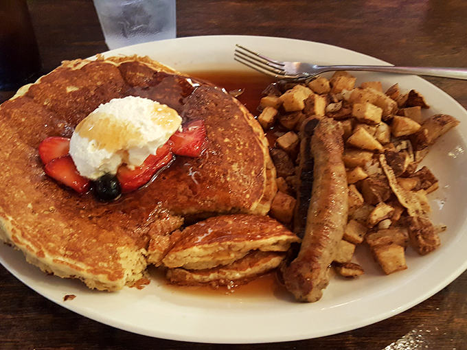 Golden pancakes with a dollop of whipped cream and fresh berries&mdash;the breakfast equivalent of hitting the lottery. Those home fries aren't playing second fiddle.