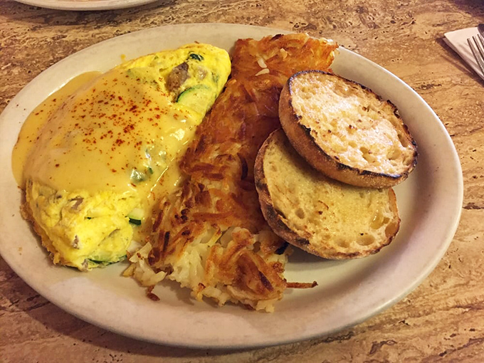 Golden perfection on a plate. This omelet practically whispers, "Cancel your plans for the day&mdash;you'll need time to fully appreciate me."