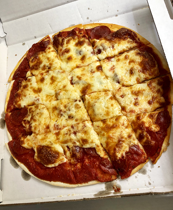 Pizza perfection in its most honest form. The golden-brown crust and perfectly melted cheese tell you everything you need to know about Nardi's priorities.