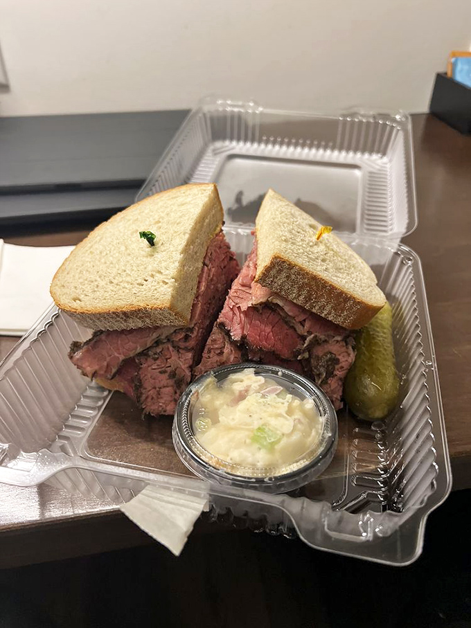 Not so much a sandwich as a skyscraper of meat&mdash;this pastrami masterpiece comes with its own area code and a pickle for scale.