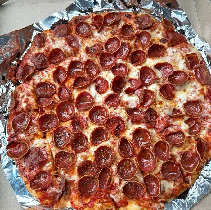 Behold the pepperoni cups! Those magical little discs that curl up to collect pools of spicy oil, creating flavor pockets that should be studied by NASA. 