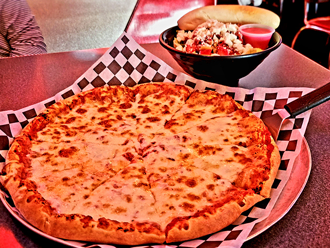 This cheese pizza isn't trying to reinvent the wheel&mdash;it's just perfecting it. The kind of simple perfection that makes you question why anyone needed to create pizza bagels. 