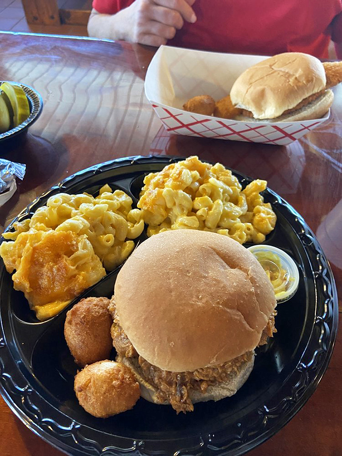 This isn't just a sandwich—it's a barbecue love letter with a side of mac and cheese that your childhood dreams were made of.