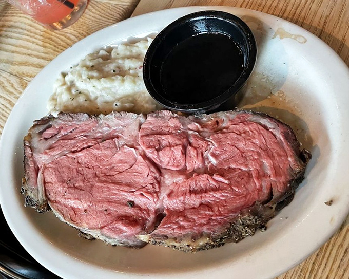 Prime rib so perfectly pink it could make a vegetarian question their life choices. The au jus is practically liquid gold.