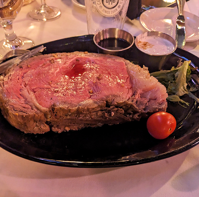 Behold the star of the show: prime rib so perfectly pink it should have its own Instagram account. That glistening au jus is liquid gold.