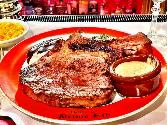 Behold the star of the show: prime rib so perfectly cooked it makes vegetarians question their life choices, served on the restaurant's signature red plate.