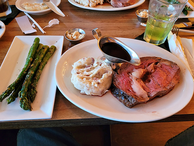 Prime rib so perfectly pink it could make a vegetarian question their life choices. The au jus isn't just a sauce—it's liquid gold.
