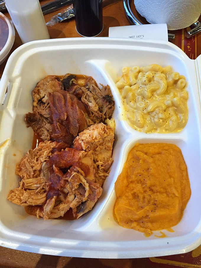 This pulled pork with mac and cheese might just make you cancel your other plans for the day. Resistance is futile against this smoky-creamy combo.