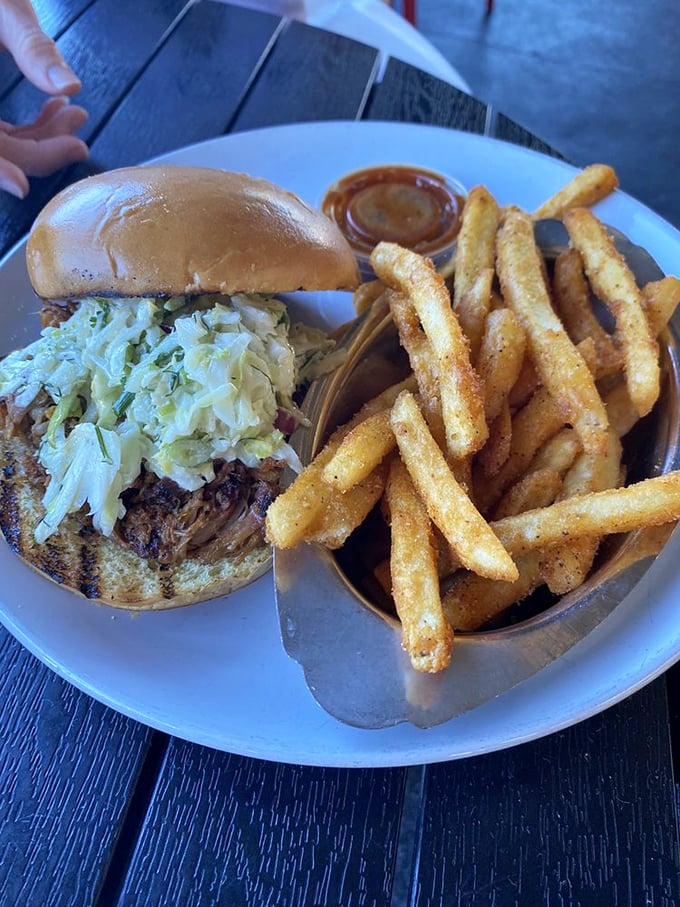 This pulled pork sandwich isn't just a meal, it's a statement of purpose &ndash; proof that happiness can indeed be served on a bun.