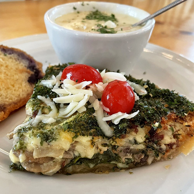 Behold the quiche that launched a thousand road trips &ndash; golden, herb-kissed perfection that redefines what breakfast can be.