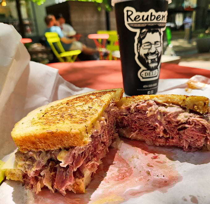 This isn't just a sandwich; it's a masterpiece of meat architecture&mdash;layers of corned beef stacked between perfectly toasted rye bread.