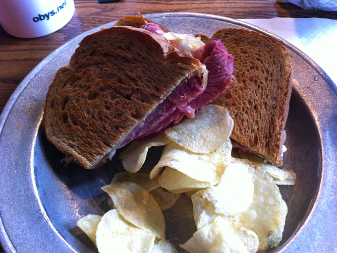 This Reuben with house chips isn't just lunch; it's an edible masterpiece that makes you wonder why you'd ever order anything else.