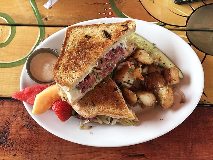 The legendary Reuben in its natural habitat&mdash;perfectly grilled, obscenely stuffed, and flanked by potatoes that didn't know they could taste this good.