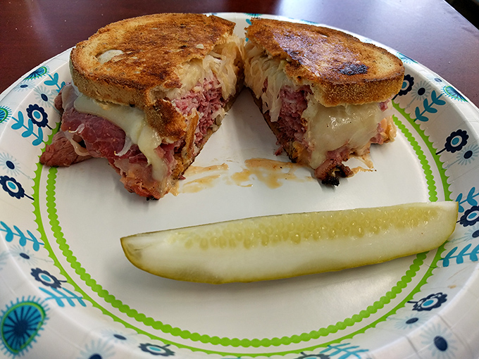 Behold the Reuben in its natural habitat&mdash;perfectly grilled, gloriously melty, and accompanied by its faithful sidekick, the pickle spear.