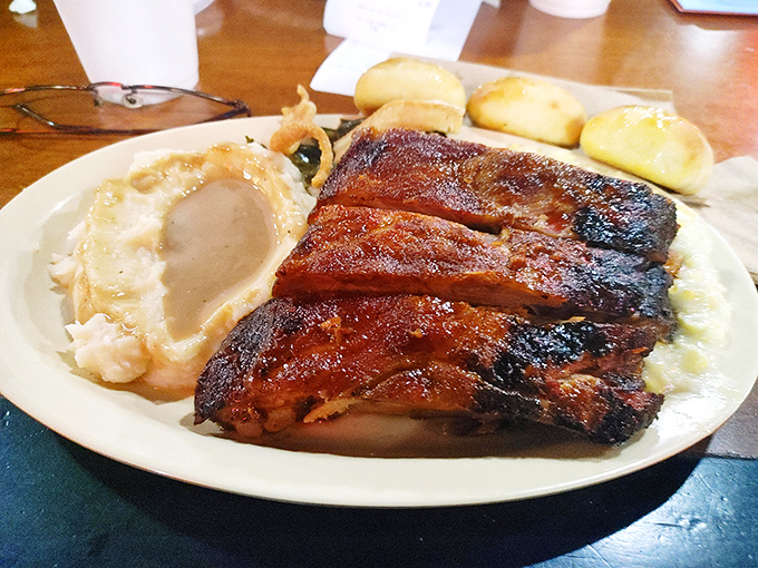 These ribs don't just fall off the bone&mdash;they practically jump onto your fork. Served with mashed potatoes and rolls that would make your grandma jealous.