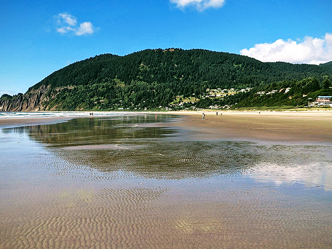Low tide transforms Manzanita's beach into a mirror gallery, reflecting skies so perfectly you'll wonder which way is up.