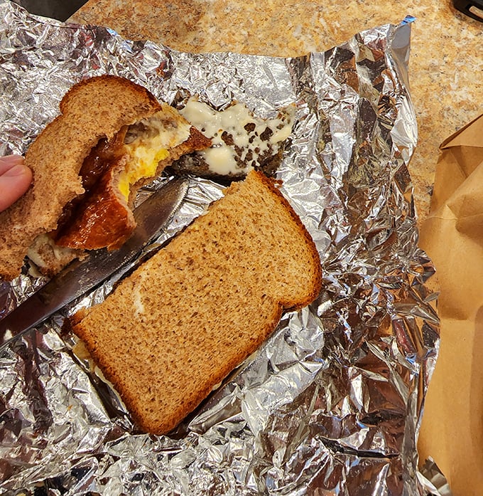 Breakfast sandwich architecture at its finest&mdash;melty cheese cascading over scrapple between perfectly toasted bread. The morning masterpiece Michelangelo never painted.